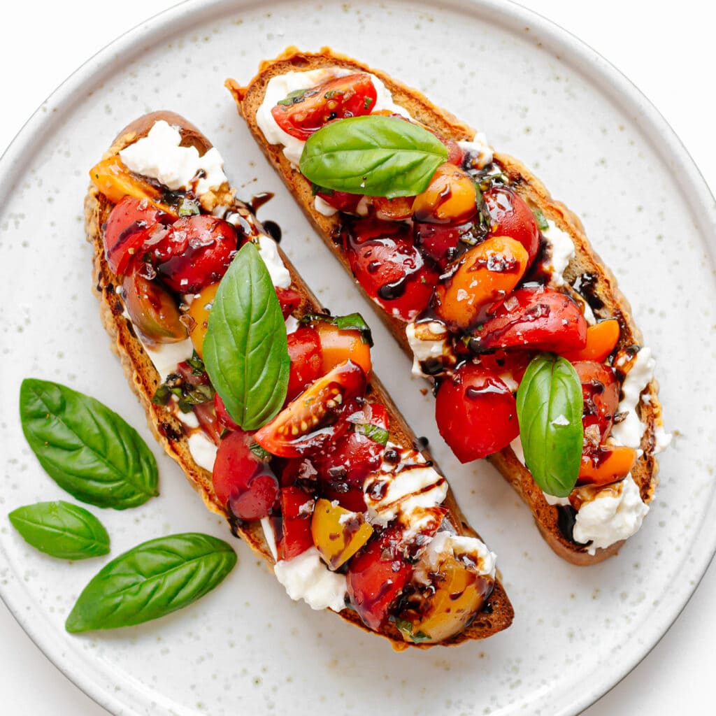 Burrata Bruschetta (with tomato basil topping) | Maple + Mango